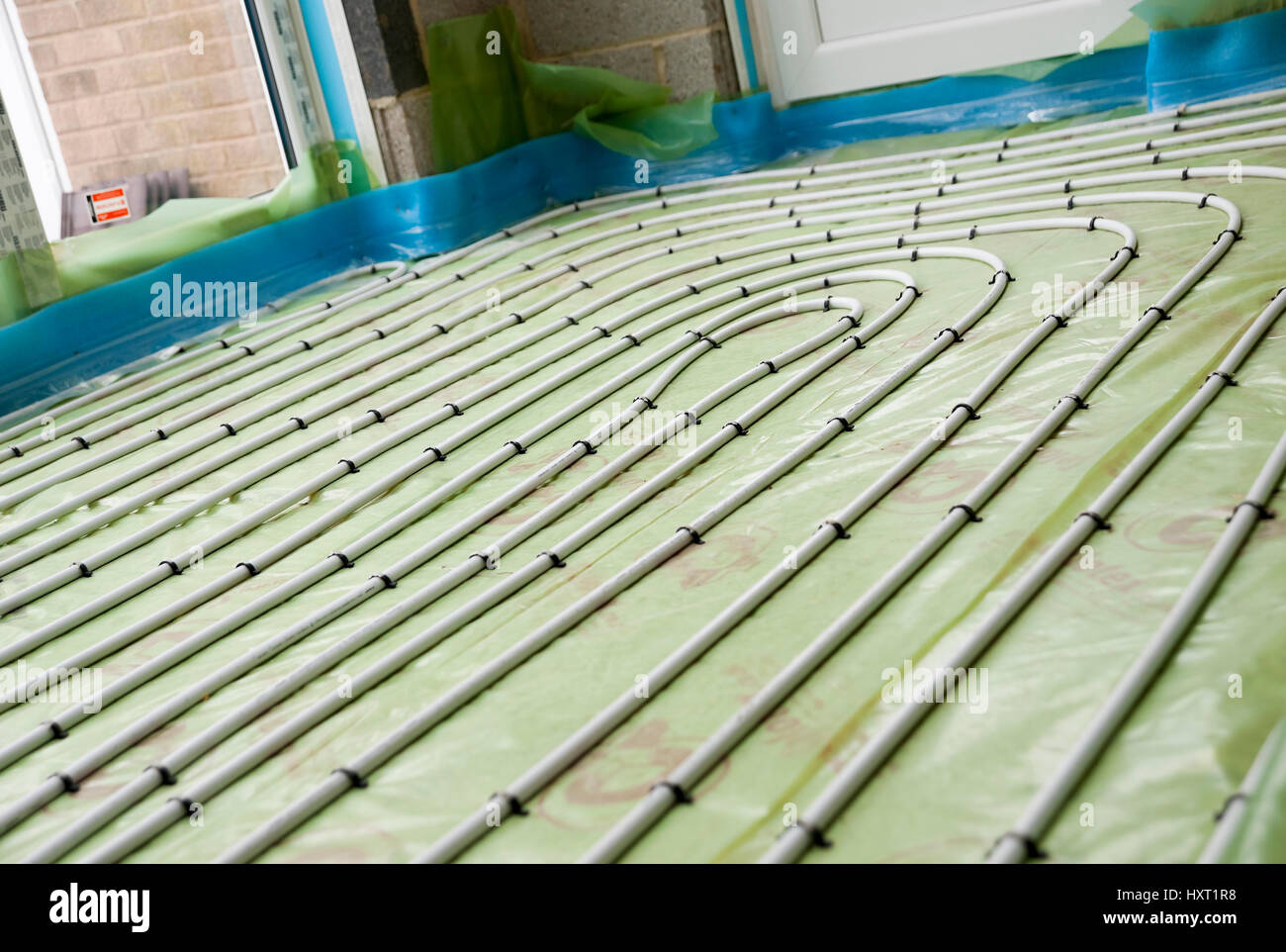 Underfloor heating pipes pipe inside house in home England UK United ...