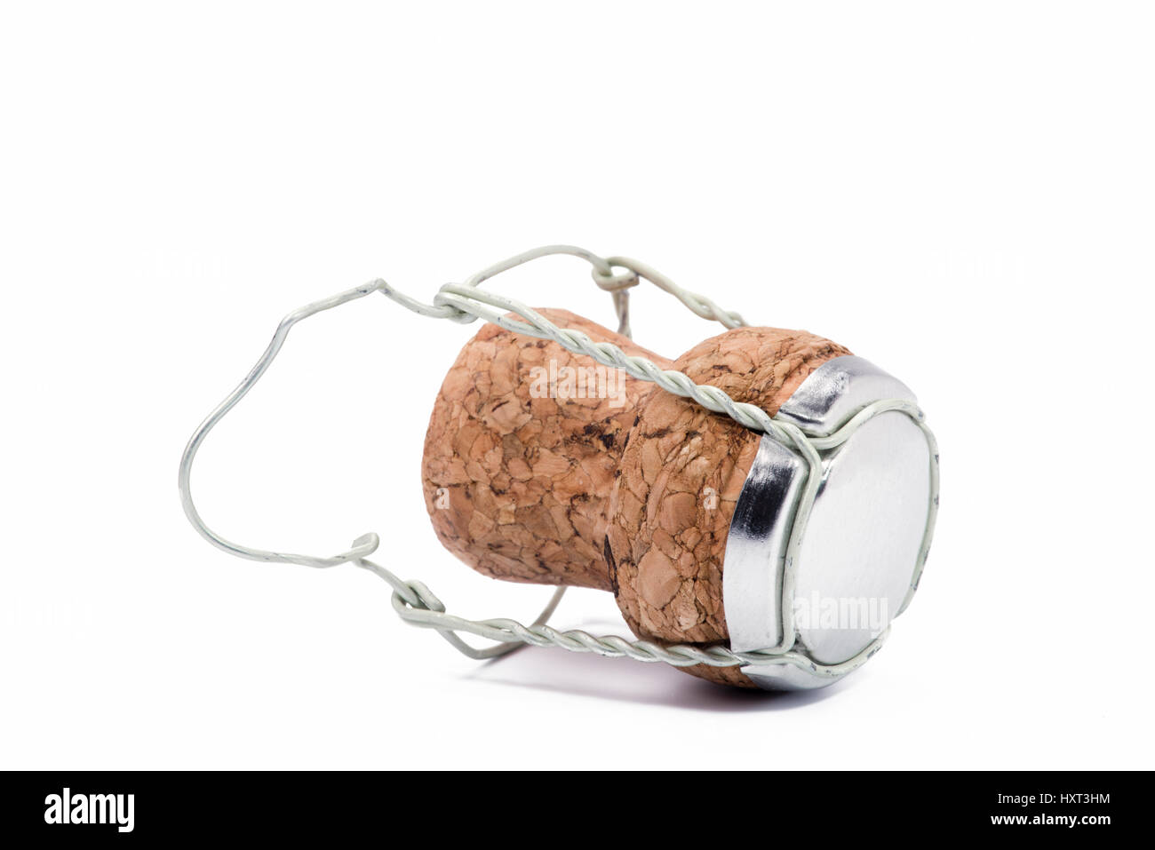 A champagne cork with metal wire after opening the bottle Stock Photo ...