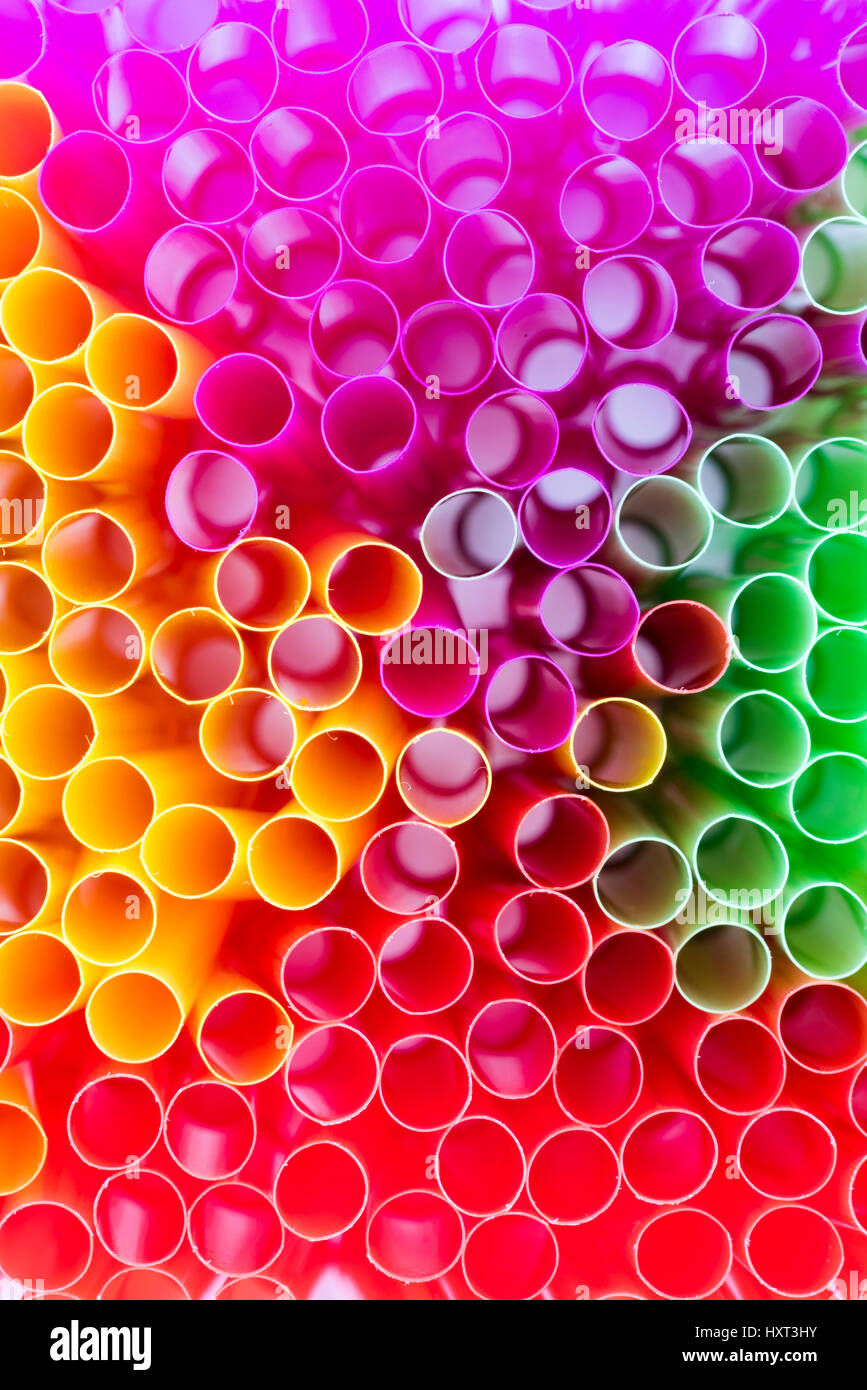 A close-up of colorful drinking straws background Stock Photo - Alamy