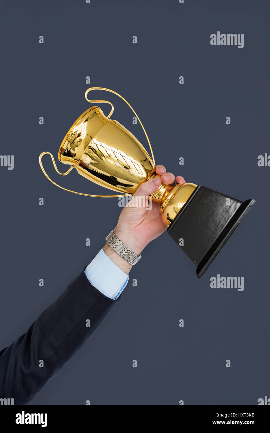 Man holding trophy hi-res stock photography and images - Alamy