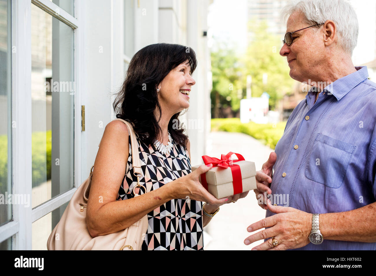 Husband giving wife box hi-res stock photography and images - Alamy