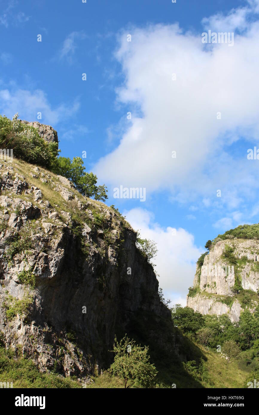 The cliffs along the road through Cheddar Gorge a popular tourist ...