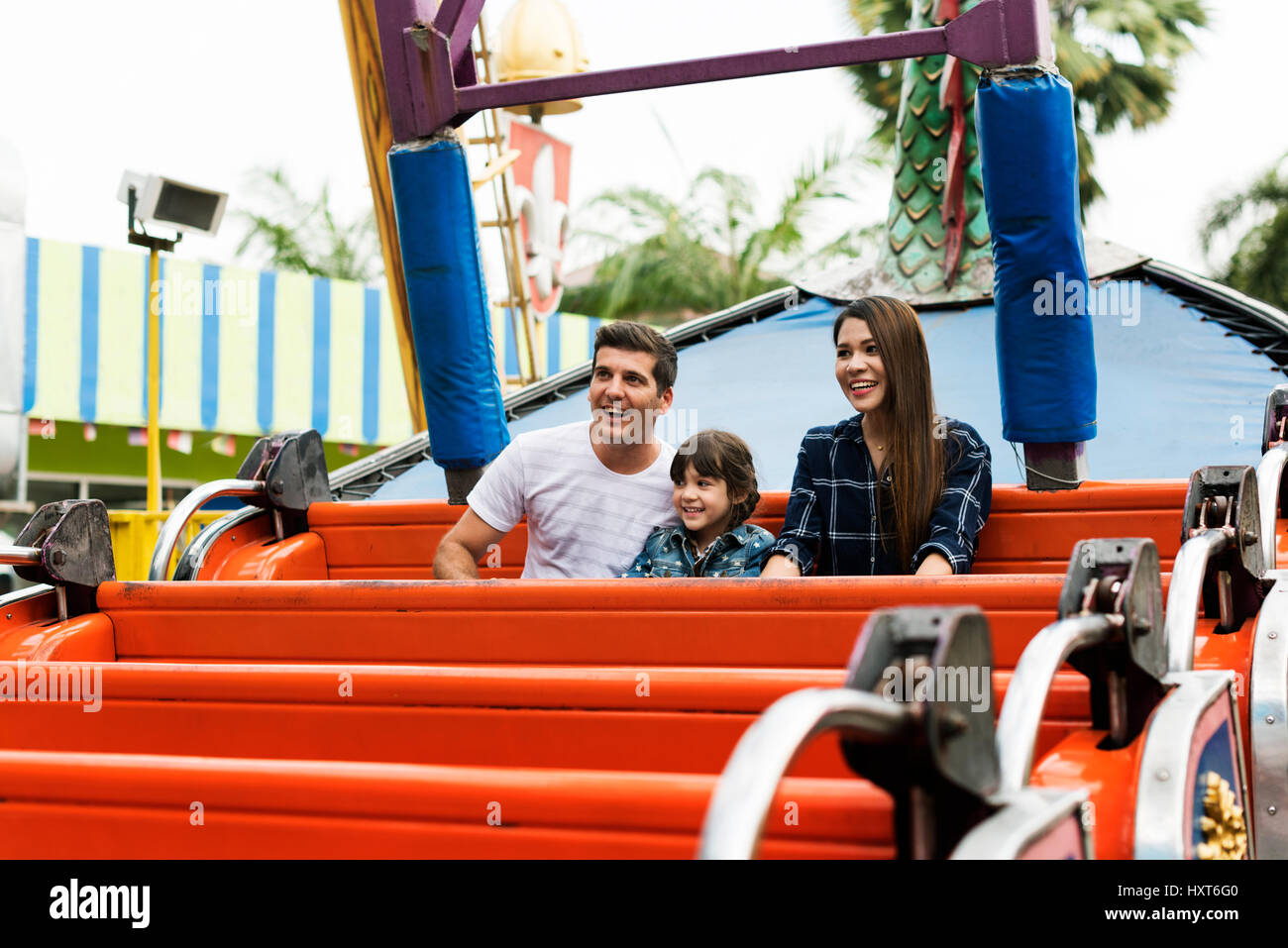 Family Holiday Vacation Amusement Park Ride Togetherness Stock Photo ...
