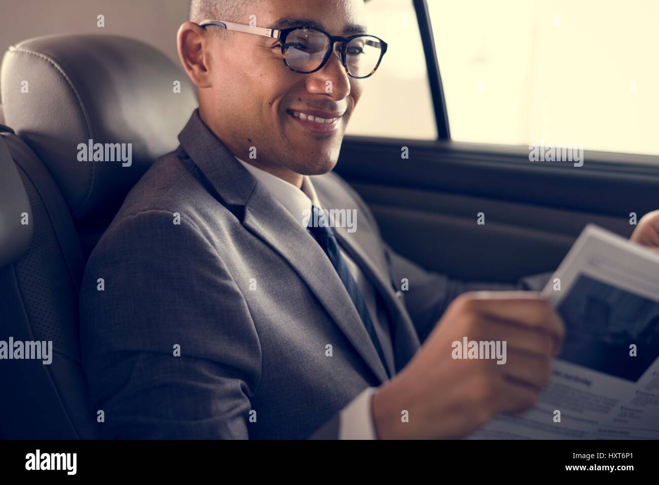 Businessman Sit Read Newspaper Inside Car Stock Photo - Alamy