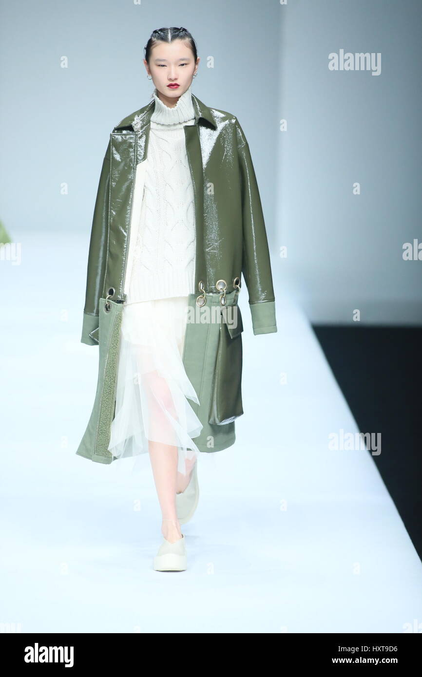Beijin, Beijin, China. 29th Mar, 2017. A model presents a creation of ...