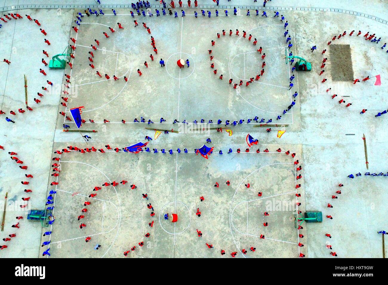 Hunan, China. 29th Mar, 2017. More than 400 students perform ...