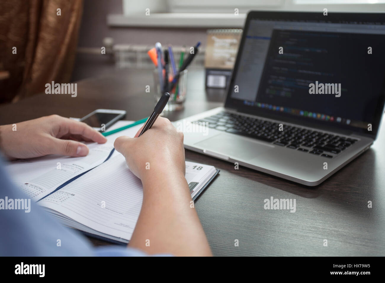 Mans notebook hi-res stock photography and images - Alamy