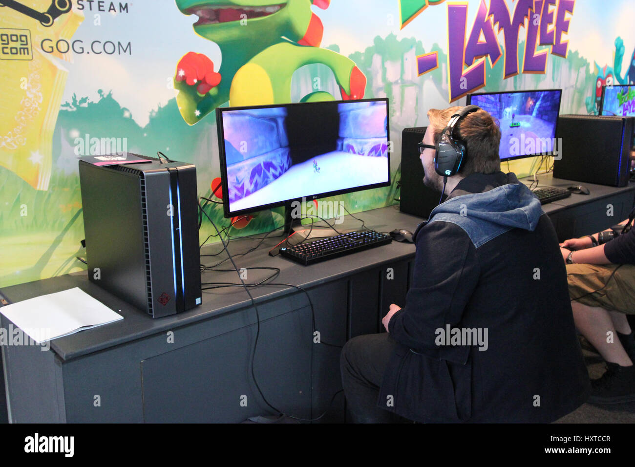 Gamers text out the latest technology at EGX Rezzed, London 2017 Stock ...