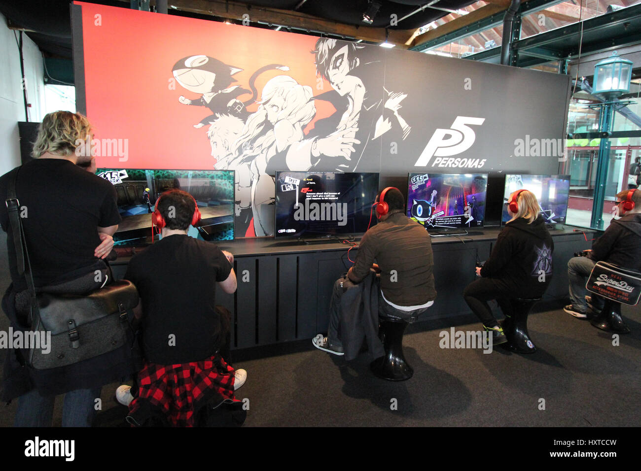 Gamers text out the latest technology at EGX Rezzed, London 2017 Stock ...