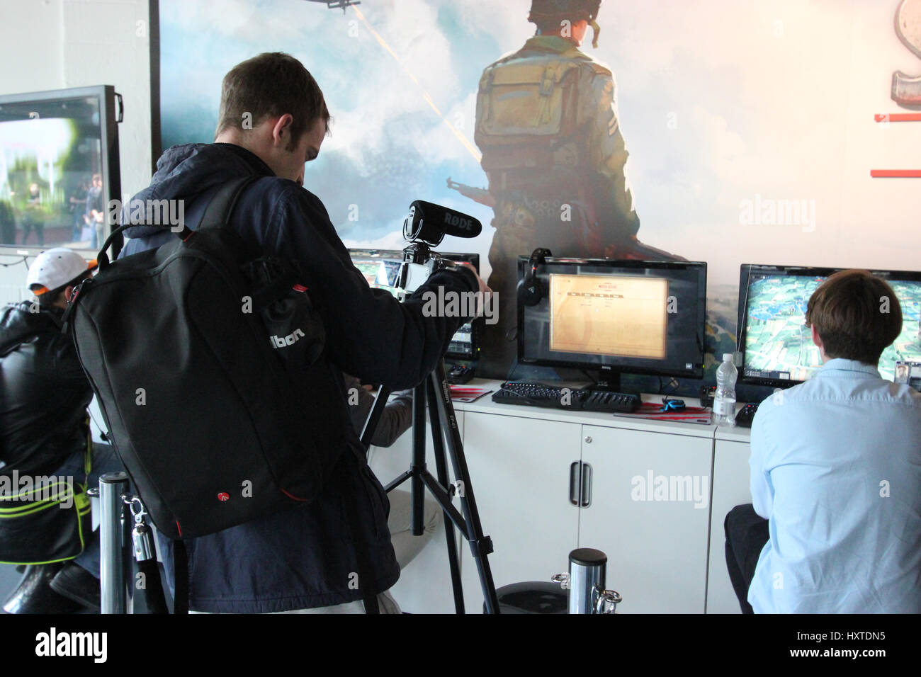 Gamers text out the latest technology at EGX Rezzed, London 2017 Stock ...