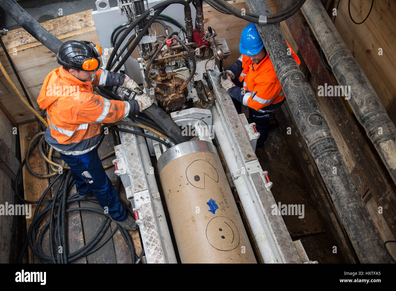 Berlin, Germany. 30th Mar, 2017. Channel diggers employed by the ...