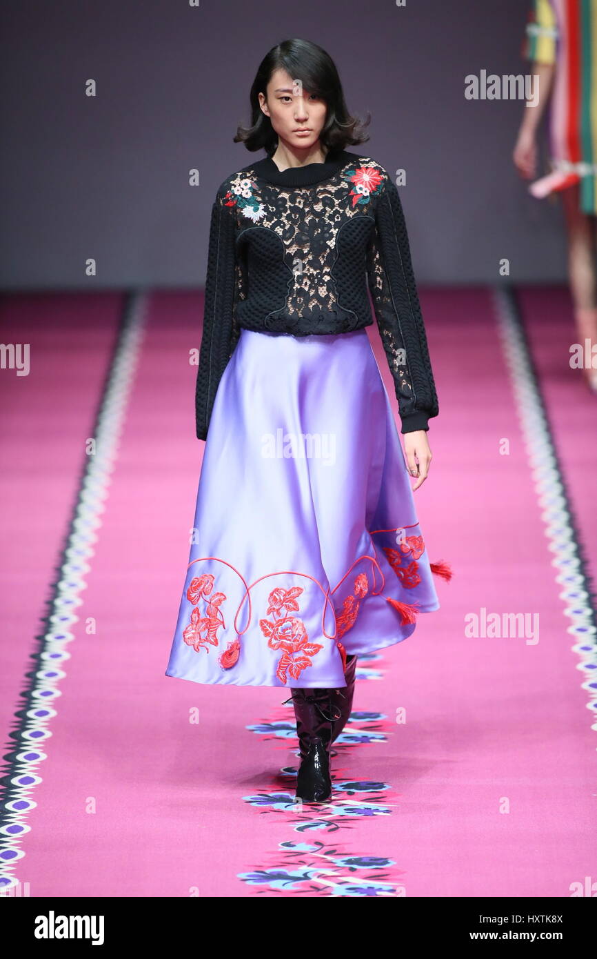 Beijing, Beijing, China. 30th Mar, 2017. A model presents a creation of ...