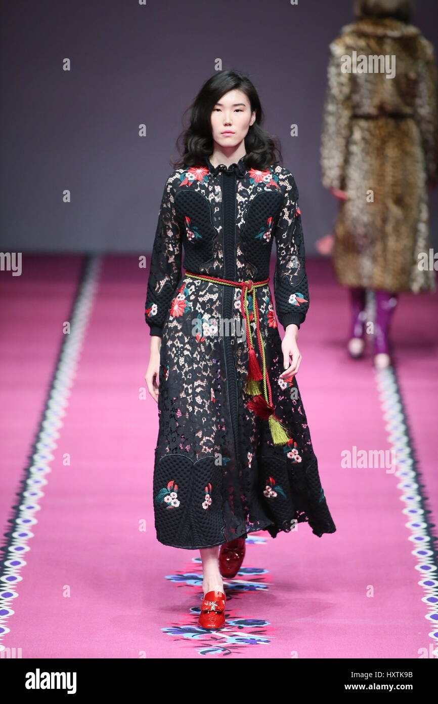 Beijing, Beijing, China. 30th Mar, 2017. A model presents a creation of ...