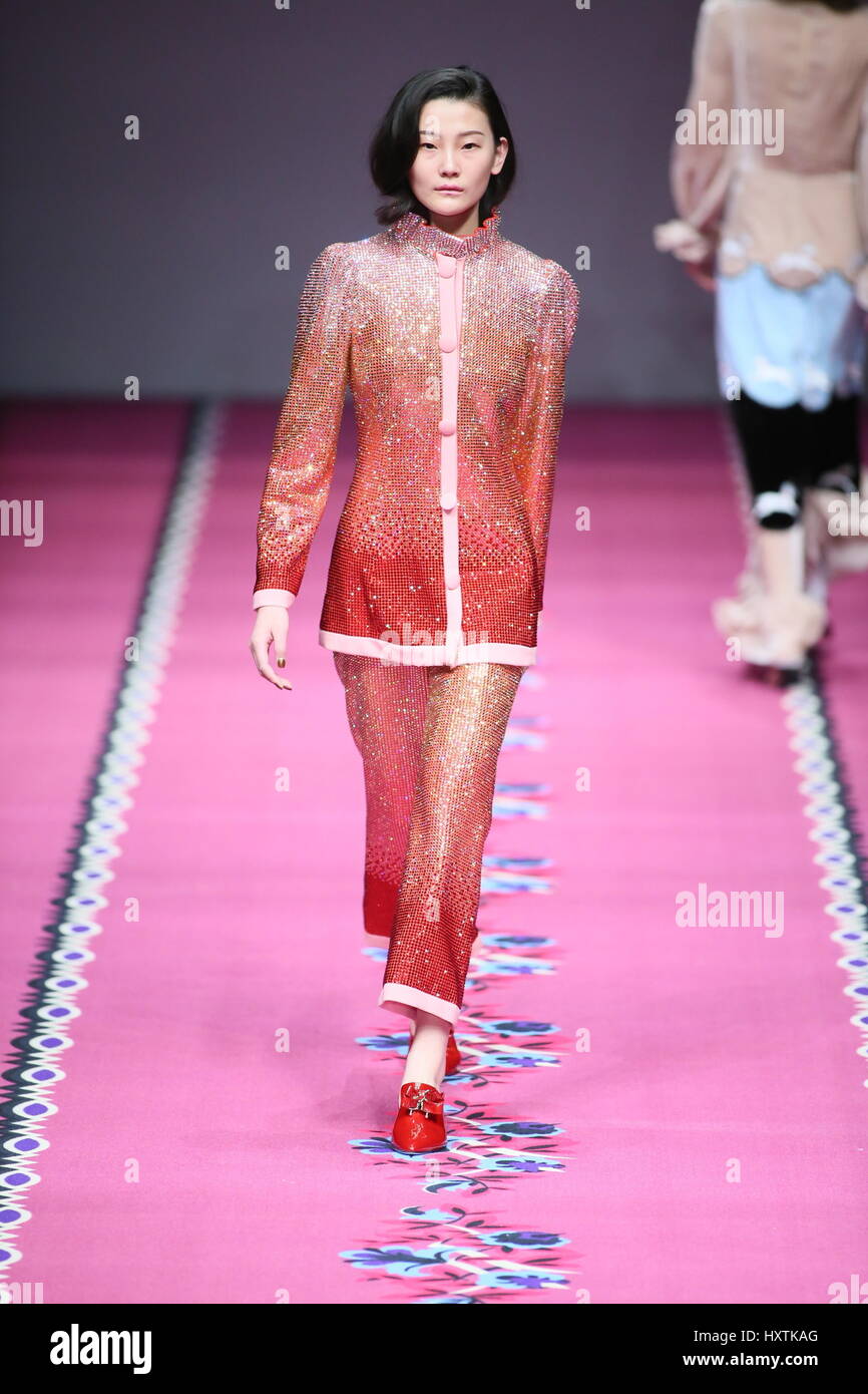 Beijing, Beijing, China. 30th Mar, 2017. A model presents a creation of ...