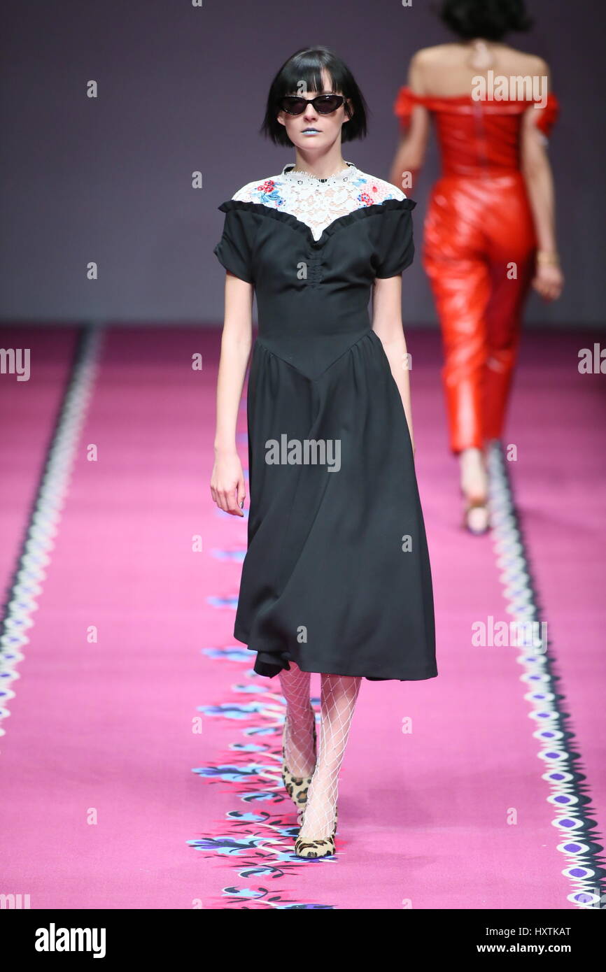 Beijing, Beijing, China. 30th Mar, 2017. A model presents a creation of ...
