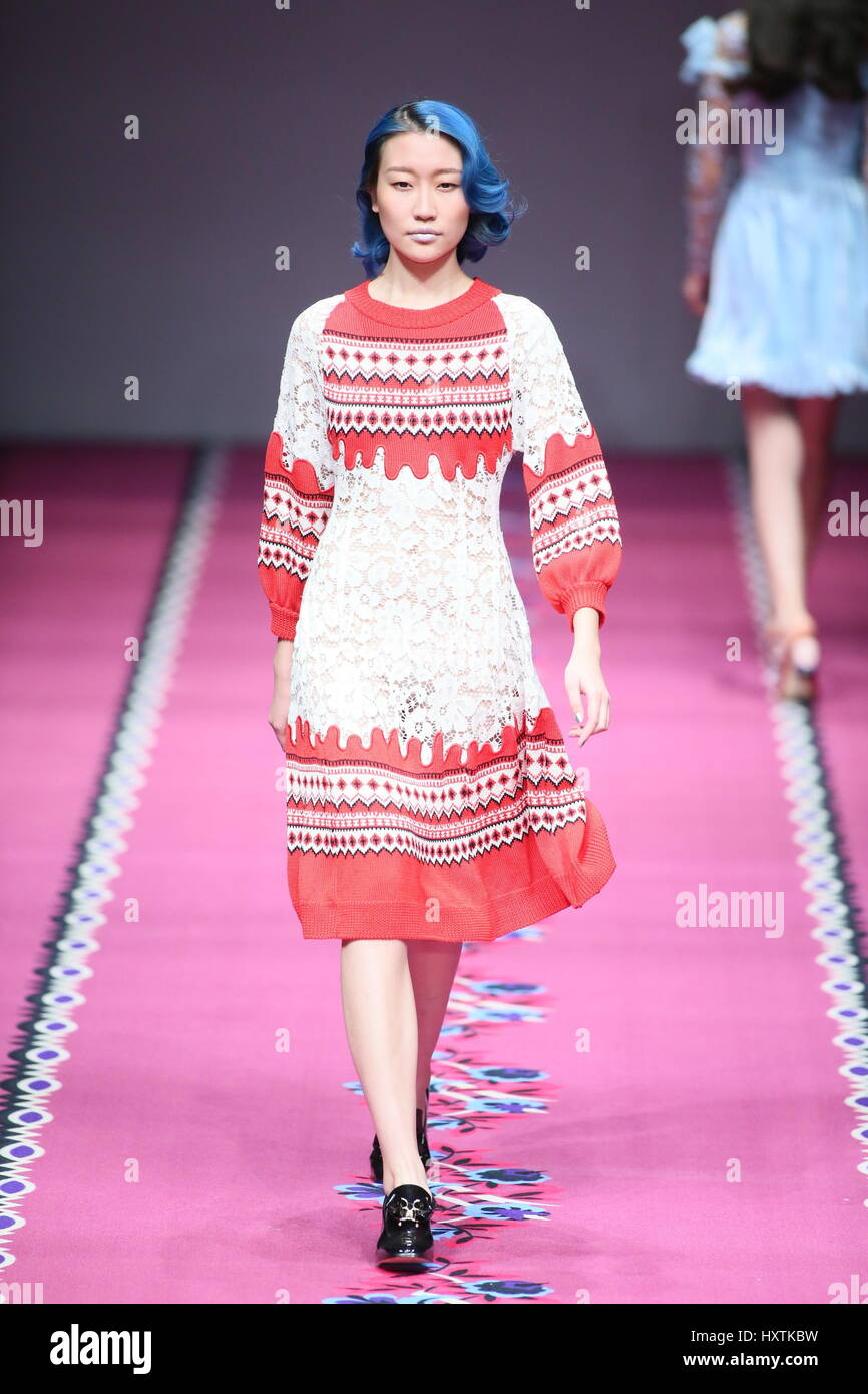 Beijing, Beijing, China. 30th Mar, 2017. A model presents a creation of ...