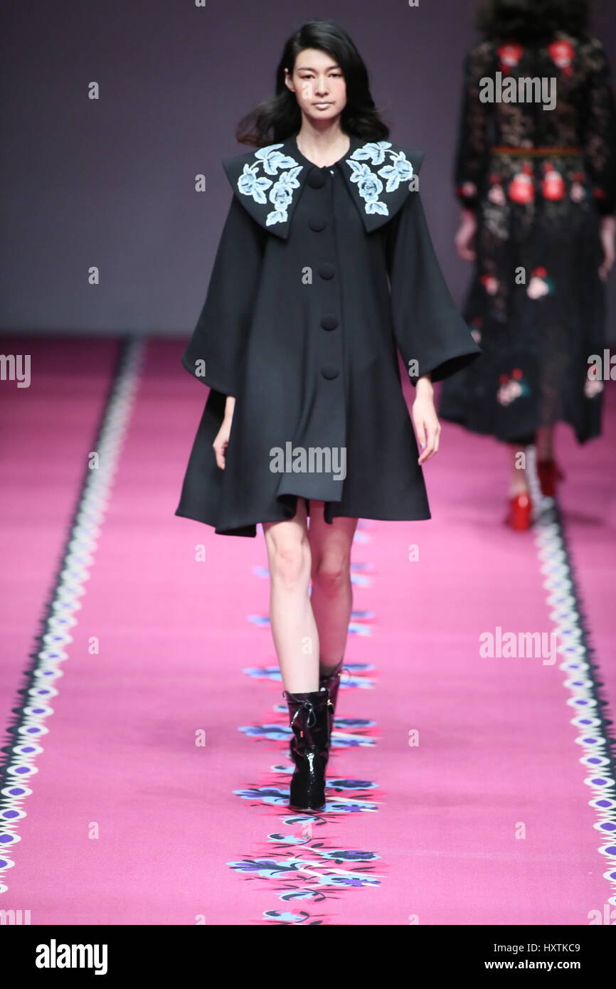 Beijing, Beijing, China. 30th Mar, 2017. A model presents a creation of ...