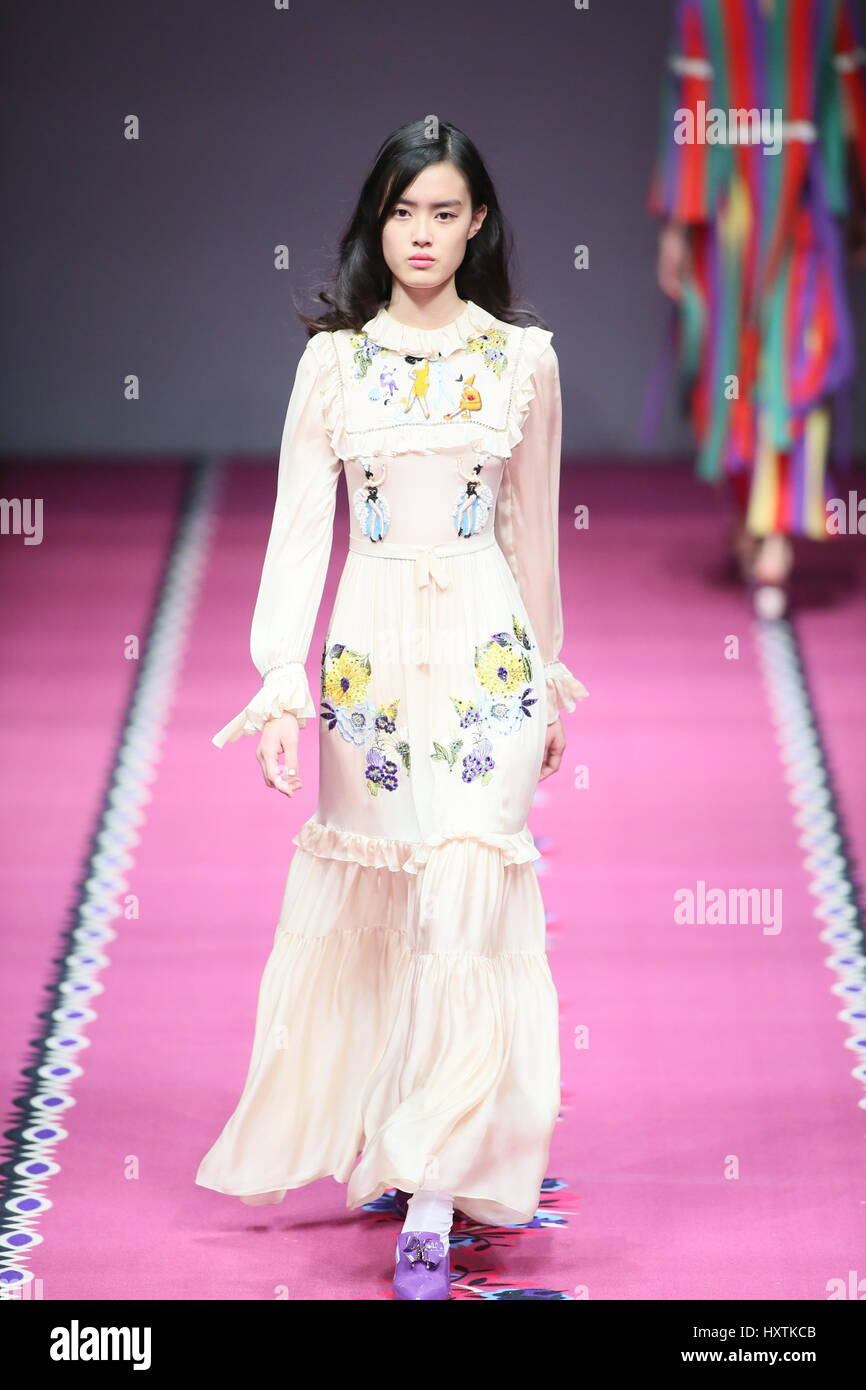 Beijing, Beijing, China. 30th Mar, 2017. A model presents a creation of ...