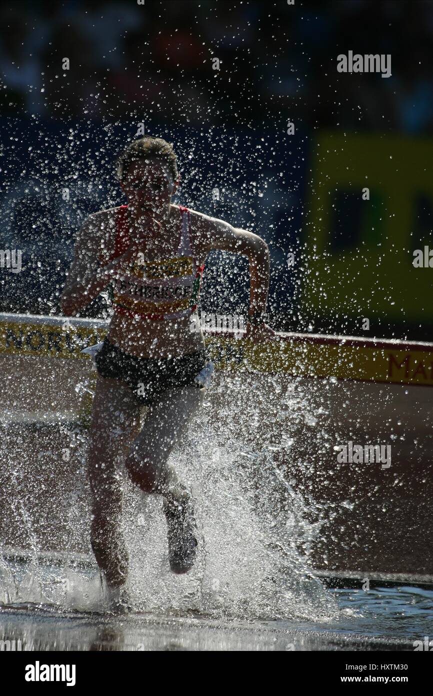 WATER JUMP 3000 METRES STEEPLECHASE MANCHESTER REGIONAL ARENA ...