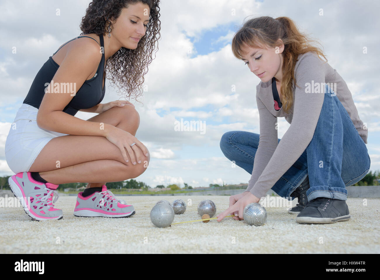 Women playing outdoor boules Stock Photo - Alamy