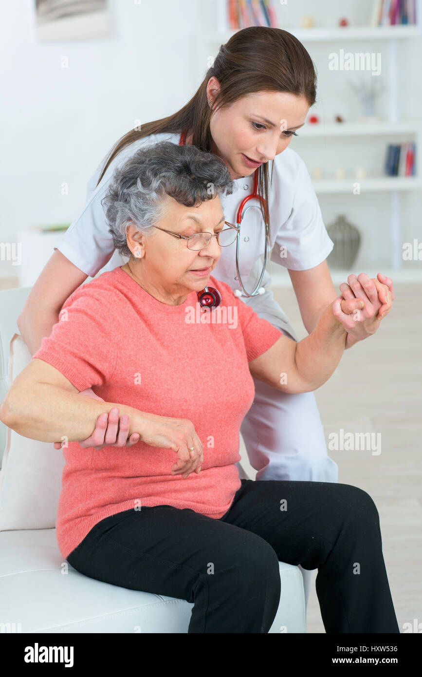 helping an elderly woman Stock Photo - Alamy