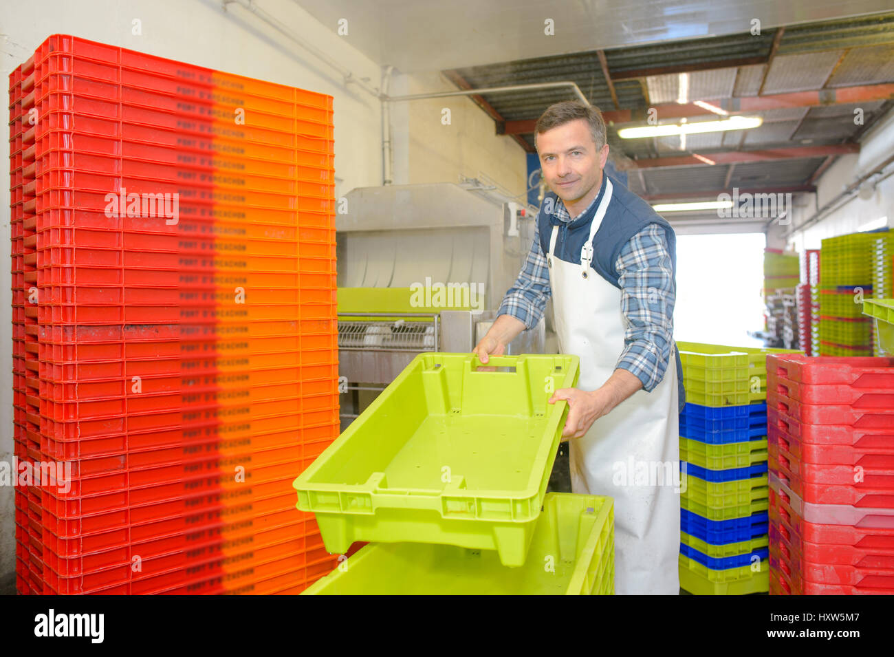Piles of empty crates hi-res stock photography and images - Alamy