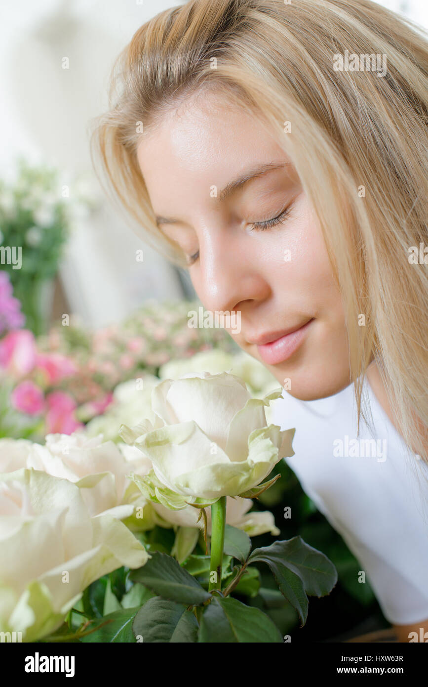 Woman smelling flower floral flowers hi-res stock photography and ...