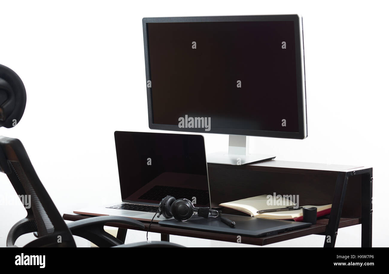 Designer desk workplace isolated on white background. Laptop with big ...