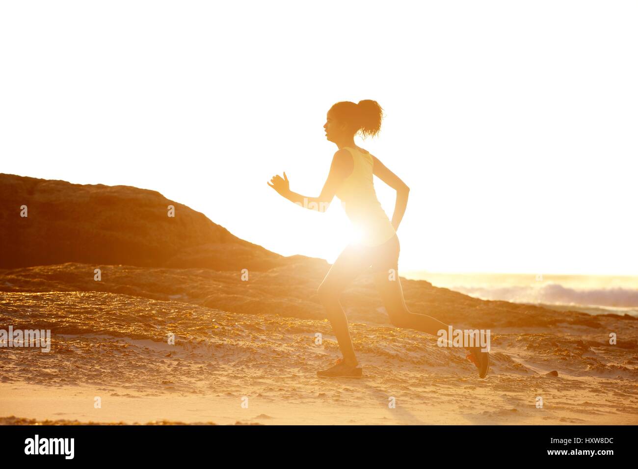 Black silhouette female runner athlete hi-res stock photography and ...