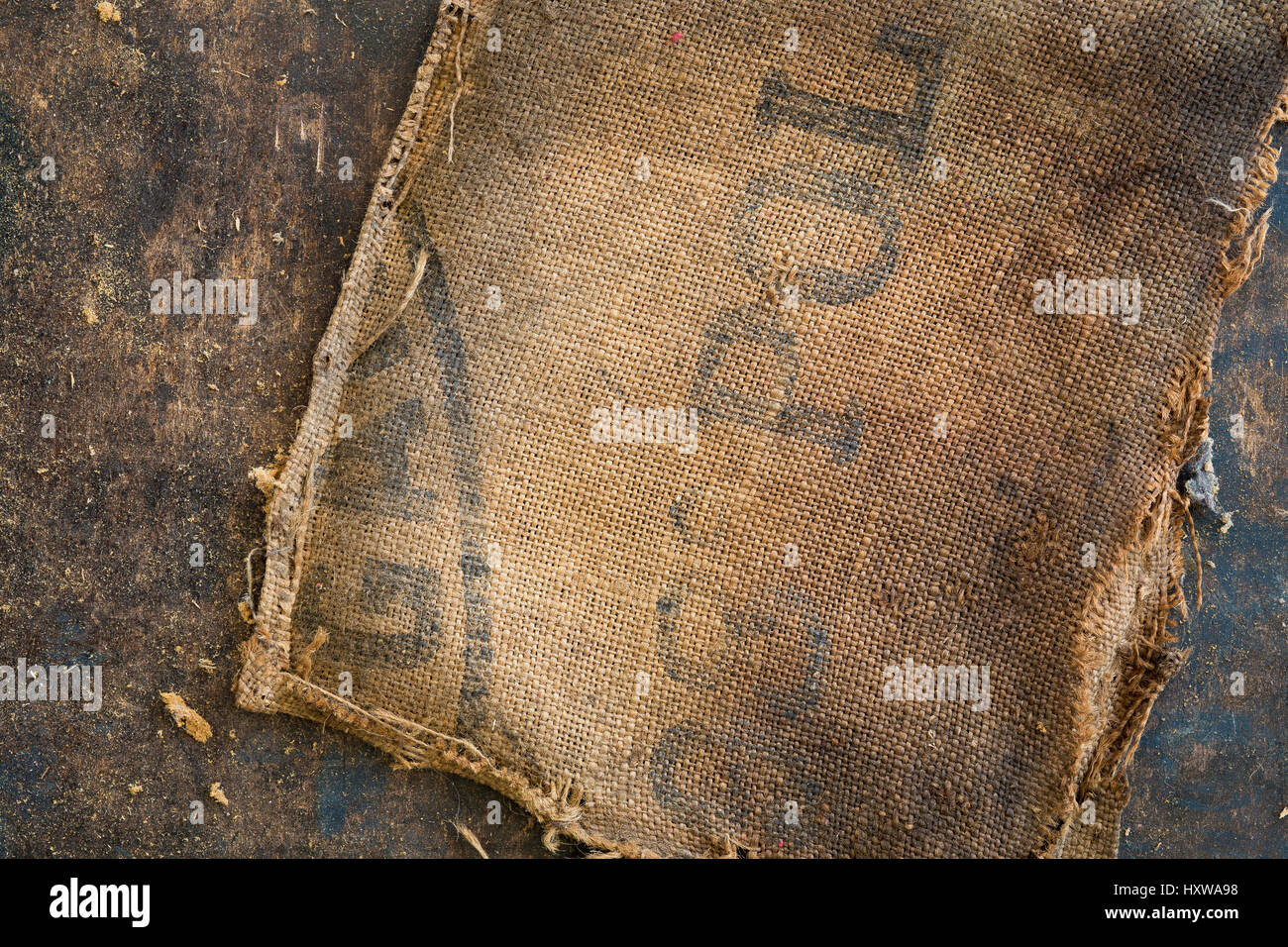 Old dirty hessian sack bag stamped used as upholstery material ...
