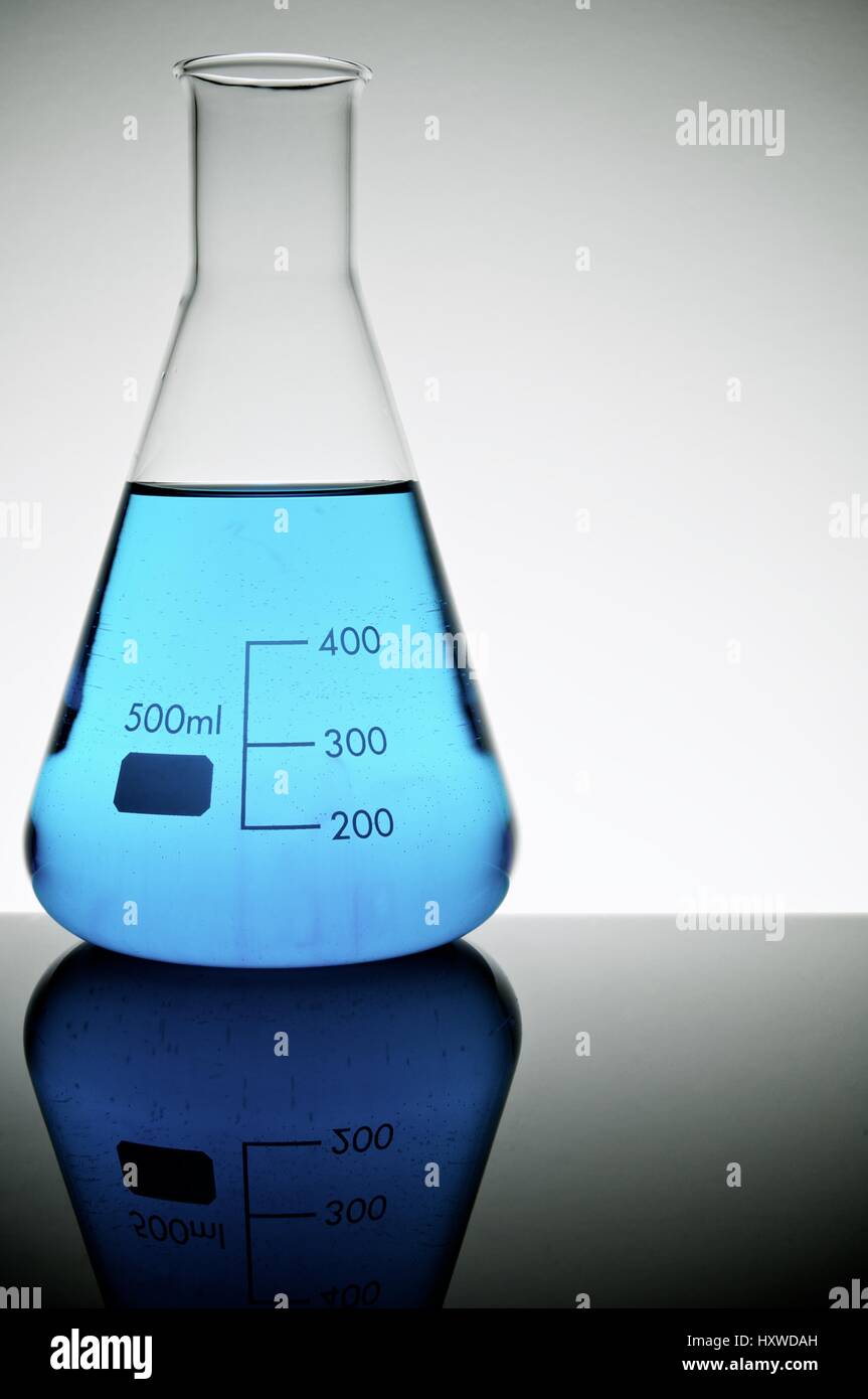 flask with blue liquid to the light and white background Stock Photo ...
