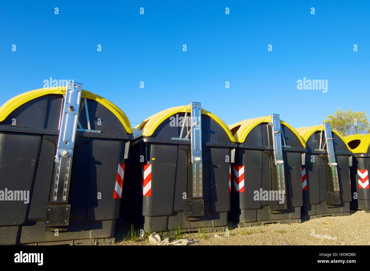 Bins group for plastic recycling and blue sky Stock Photo - Alamy
