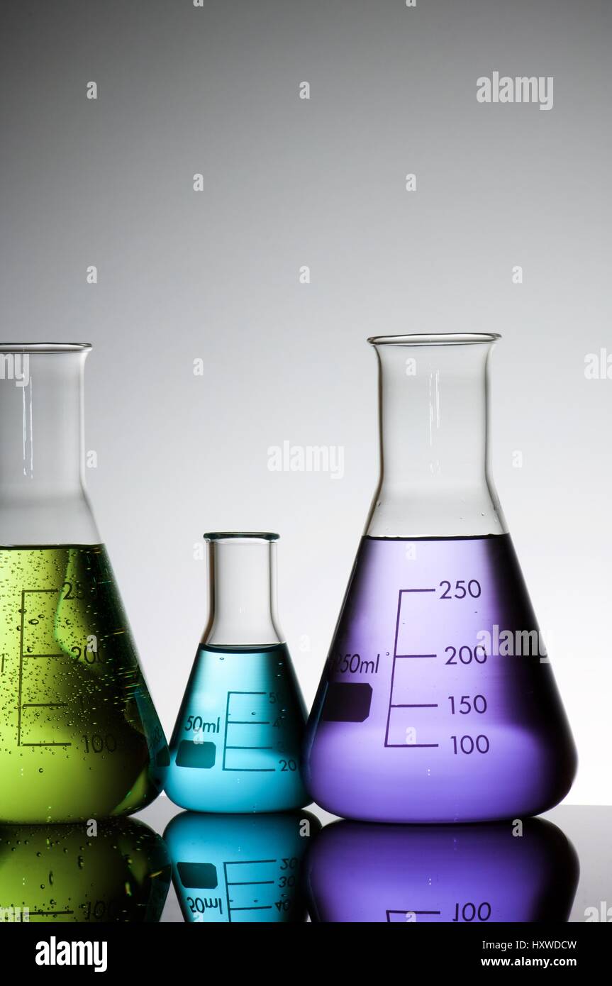 group of laboratory flasks with liquid inside Stock Photo - Alamy