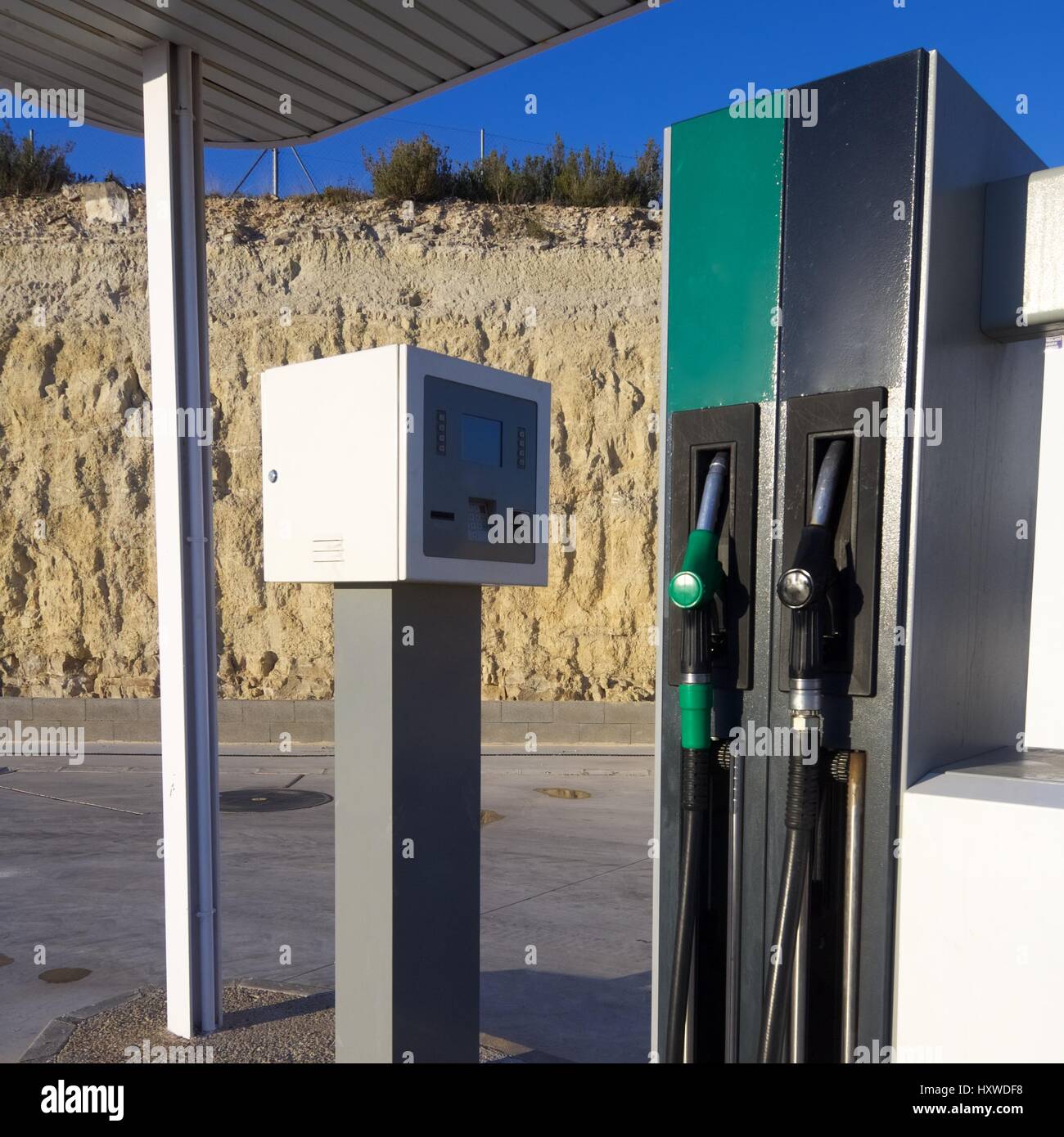 Close hose spout of a gas station Stock Photo - Alamy