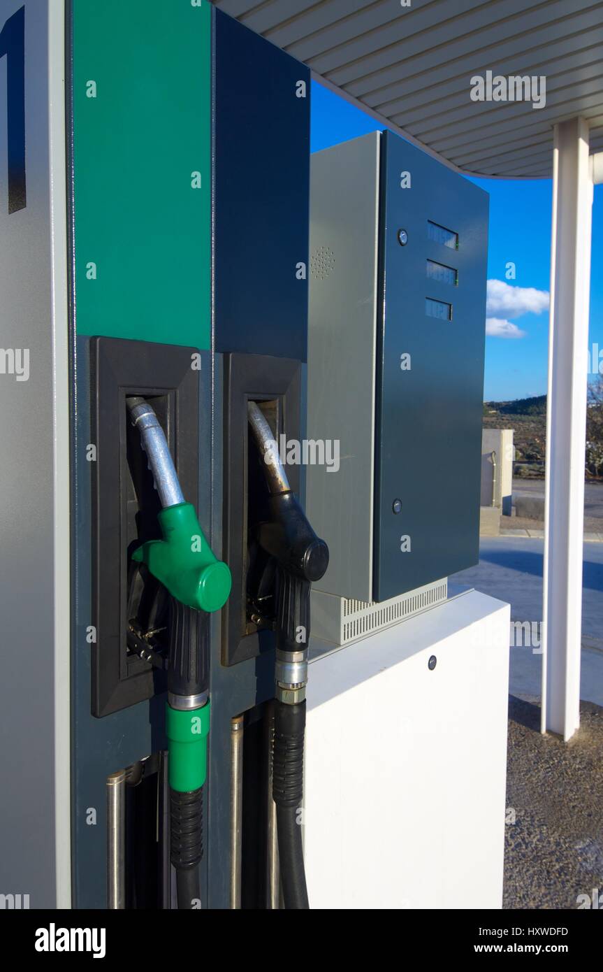 Close hose spout of a gas station Stock Photo - Alamy