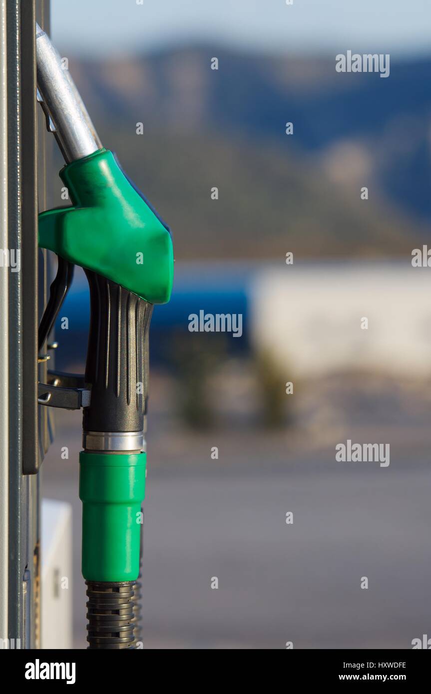 Close hose spout of a gas station Stock Photo - Alamy