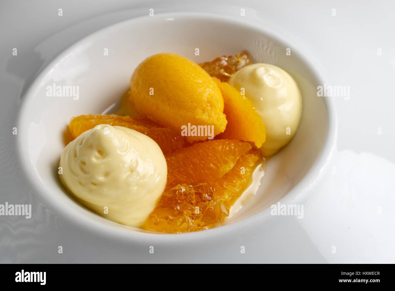 peach ice cream with citrus and shuffle Stock Photo - Alamy