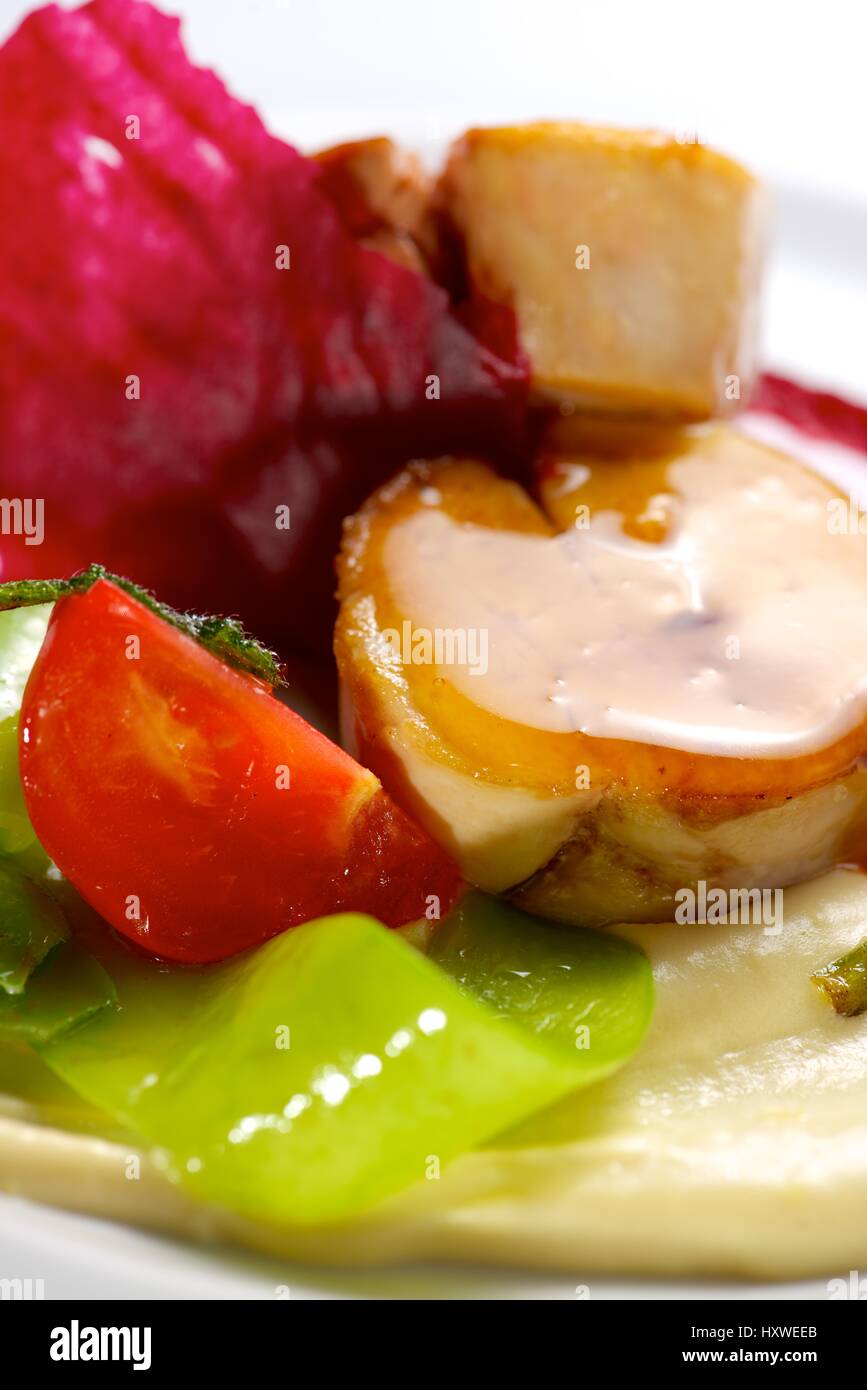 Closeup of a modern chicken dish with beets Stock Photo - Alamy