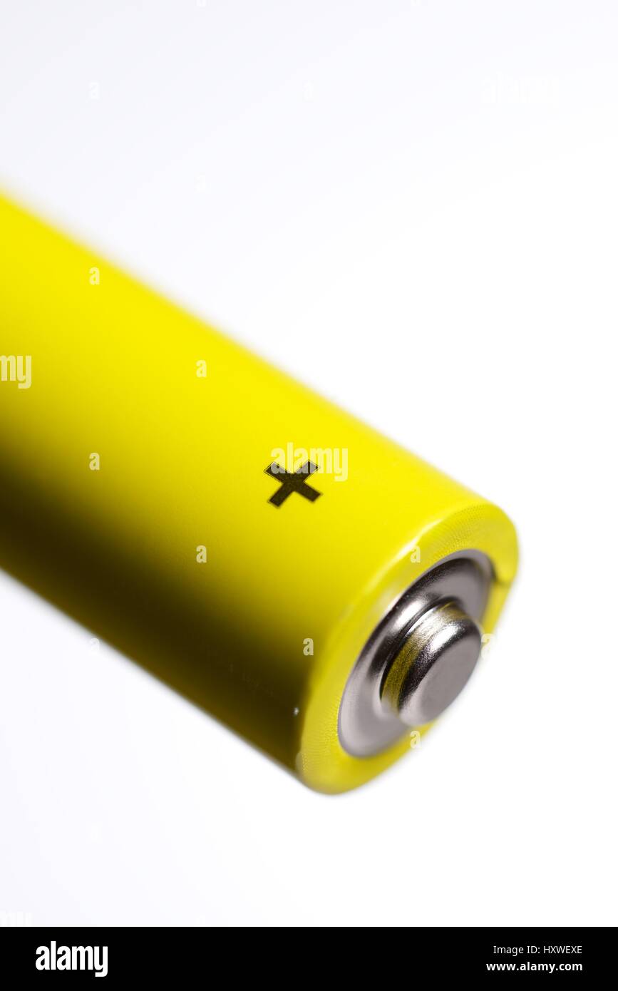 forefront of a AA battery and white background Stock Photo - Alamy