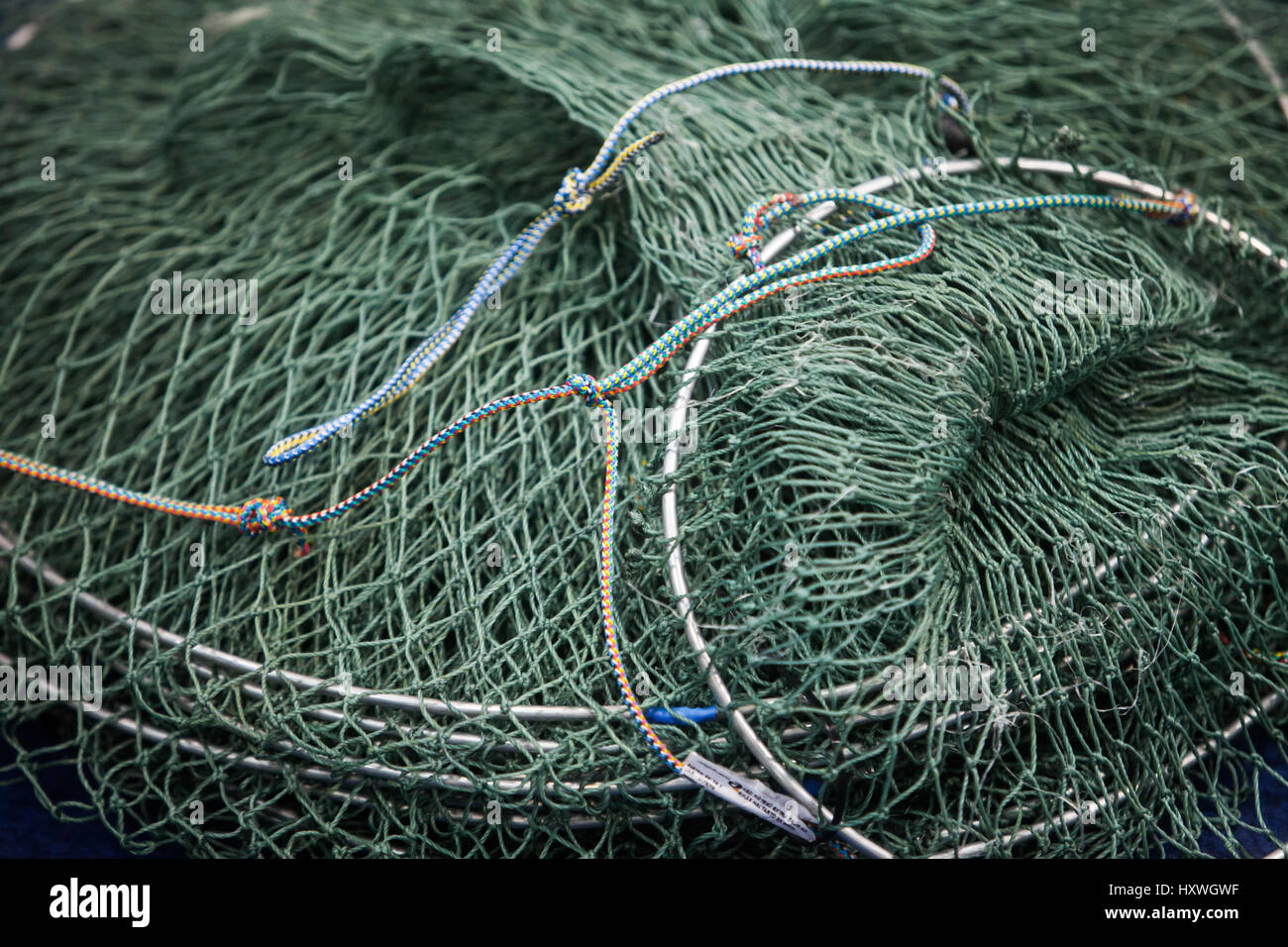 Close up image of a fishing net Stock Photo - Alamy
