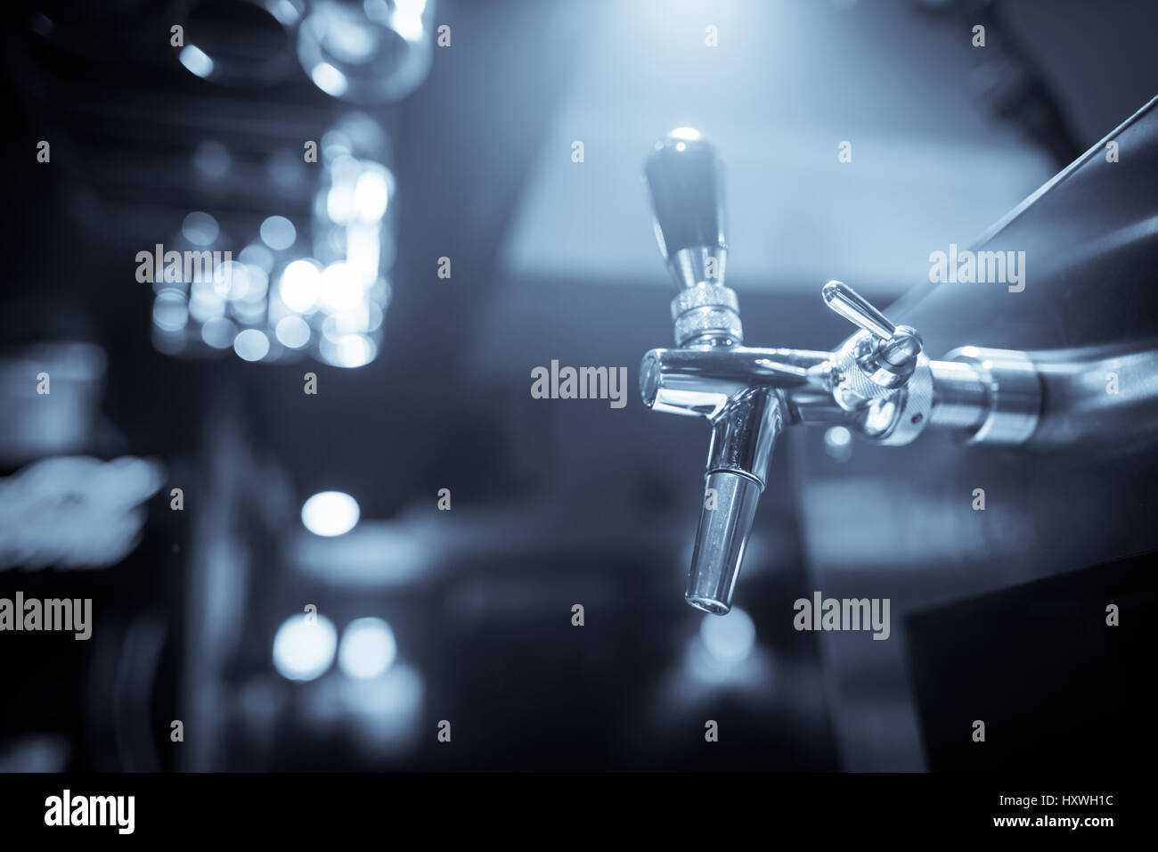 Color close up image of a beer tap in bar or restaurant Stock Photo - Alamy