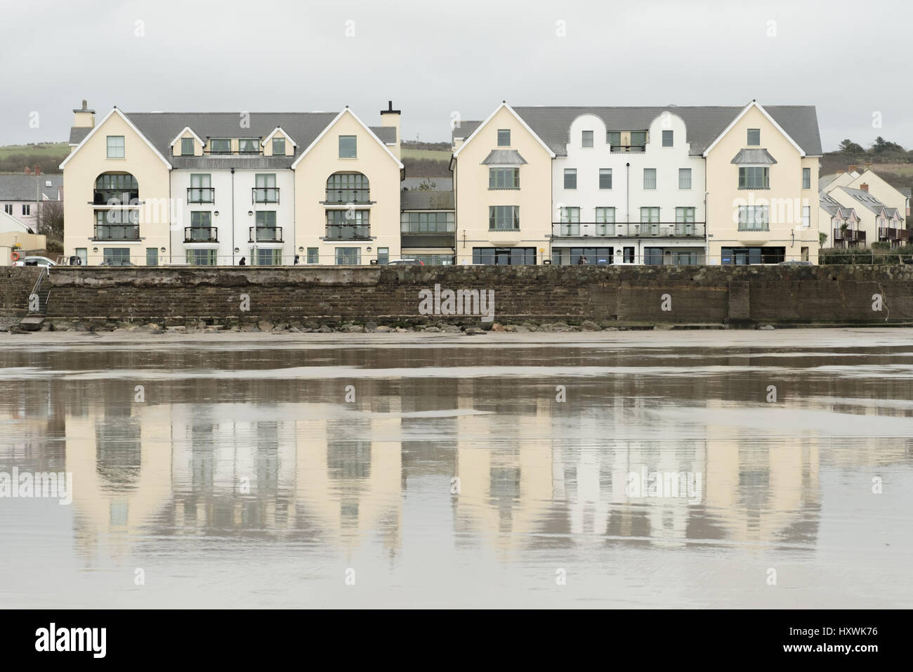 Broadhaven in winter with reflection in the sand Stock Photo - Alamy