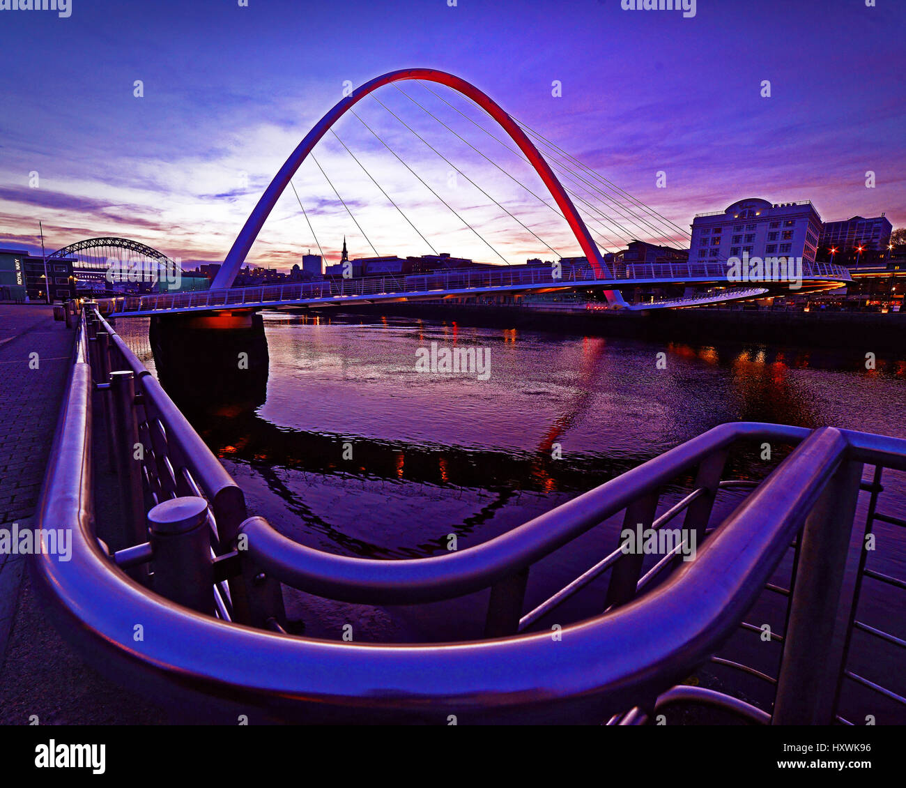 Gateshead Millennium tilt winking eye bridge at sunset Stock Photo - Alamy