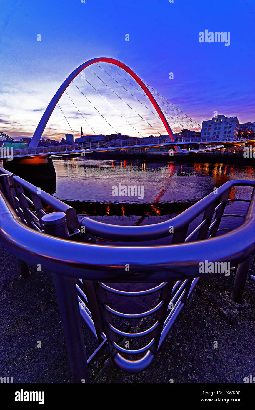 Gateshead Millennium tilt winking eye bridge at sunset Stock Photo - Alamy