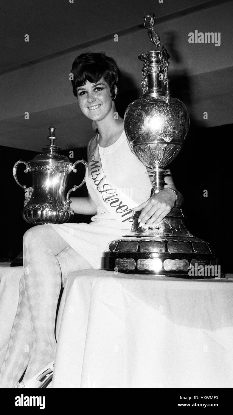 Miss Liverpool for 1967, Linda Foulder, 19, alongside the FA Cup (l ...