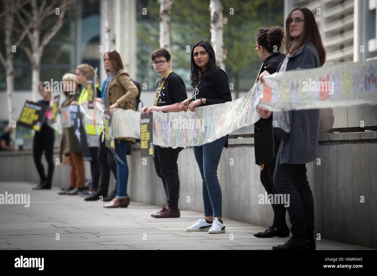 People take part in a demonstration by Amnesty International and the ...