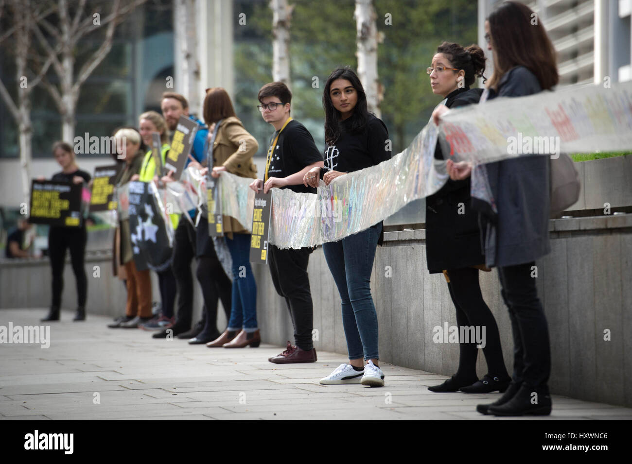 People take part in a demonstration by Amnesty International and the ...