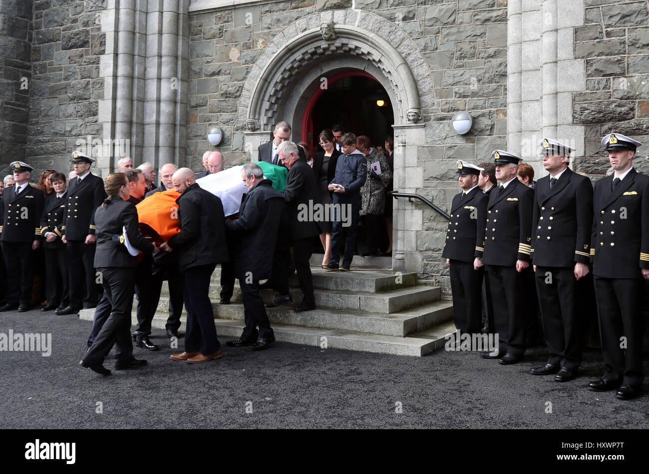 The coffin of Captain Mark Duffy is carried from St Oliver Plunkett ...