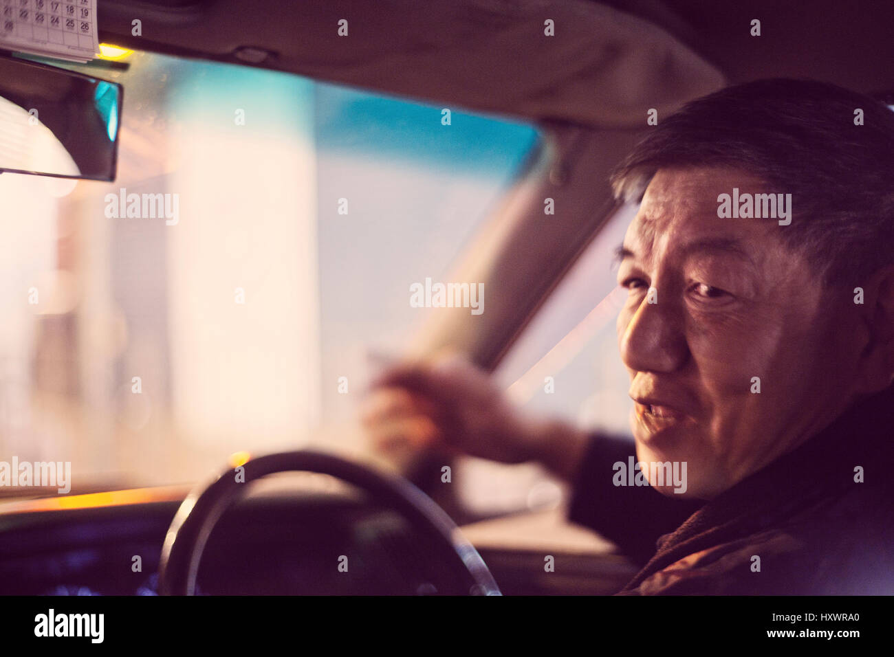 Chinese taxi driver hi-res stock photography and images - Alamy