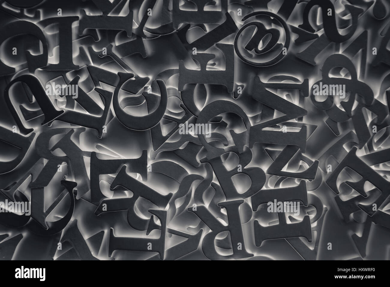 Black Latin Letters as an abstract background Stock Photo - Alamy